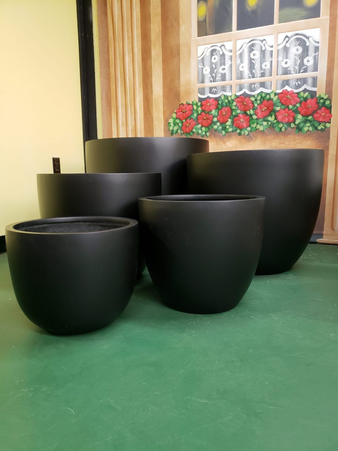 Modern, lightweight, & durable fiberglass planters that stand out
